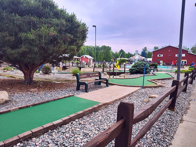 Adventure Zone's mini-golf course proves retirement doesn't mean putting away fun—just putting with more creative excuses for those above-par scores.