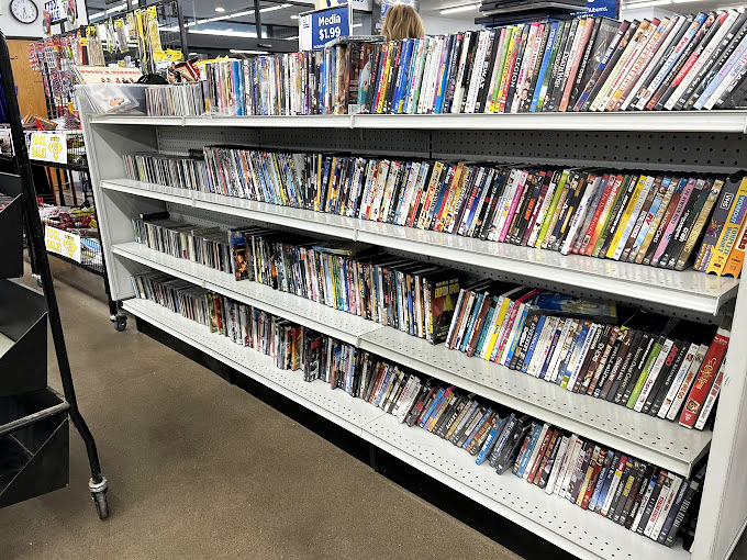 DVD shelves packed tighter than a Wisconsin fish fry on Friday night—proof that physical media still has devoted fans in the streaming age.