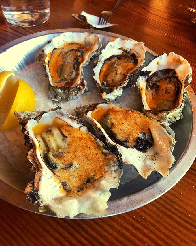 These aren't your average oysters—they're flavor grenades topped with spices that make you wonder why you ever ate them plain.