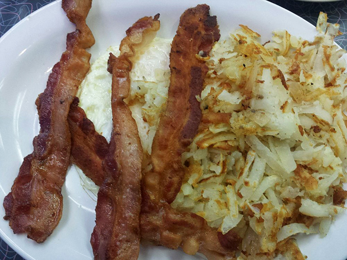 Crispy hash browns and perfectly cooked bacon—the breakfast equivalent of Astaire and Rogers, timeless and impeccably paired.