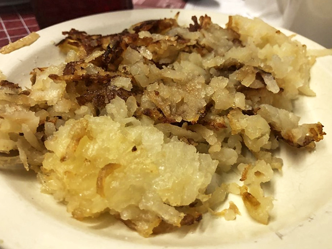 Hash browns done right—crispy edges, tender centers, and just enough grease to remind you that you're alive. Diet culture's kryptonite never looked so good.