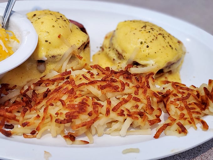 Benedict perfection with hash browns crisped to golden glory. This plate has more layers than your favorite mystery novel—and solves the riddle of breakfast satisfaction.
