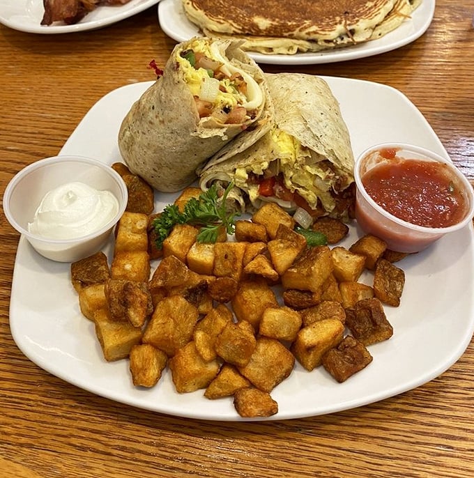 This breakfast burrito doesn't just start your day—it launches it into orbit, with those perfectly seasoned home fries playing a delicious supporting role.