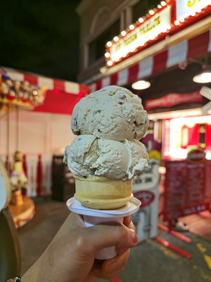 Two perfect scoops standing tall on a waffle cone—proof that sometimes the simplest pleasures are the most magnificent.