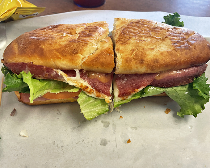 The Italian sub at 73 Grill doesn't whisper "mangia"—it belts it out with layers of meat, cheese, and fresh veggies on a crusty roll. 
