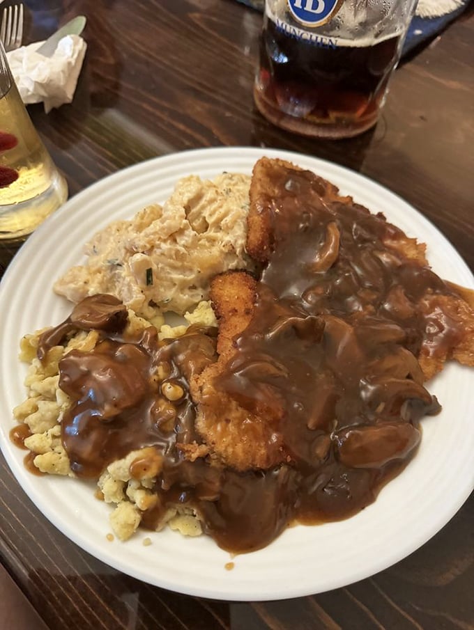 Jägerschnitzel arrives golden and crispy, proving some culinary classics never need updating or modern interpretation.