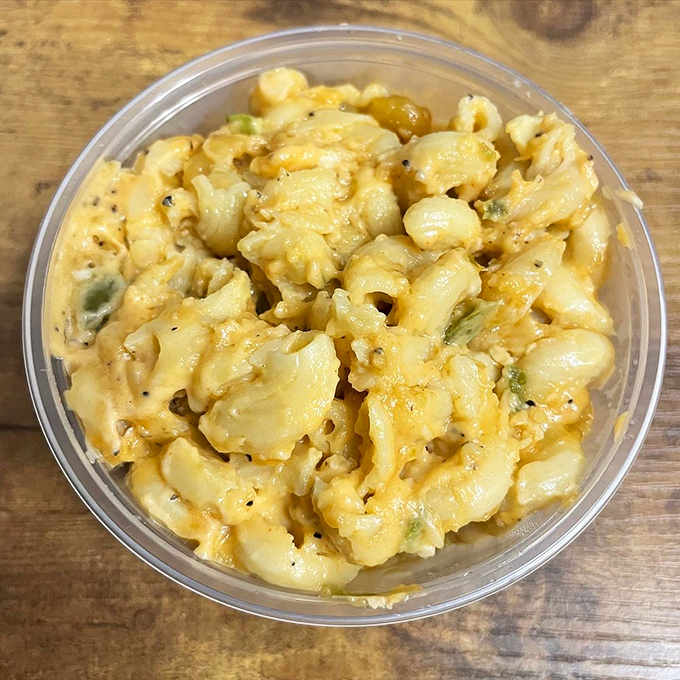 Mac and cheese that doesn't know it's a side dish. This jalapeño-kissed masterpiece demands equal billing with the meats.