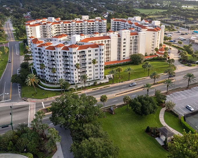 White-walled condominiums with terracotta roofs offer affordable waterfront living—the Florida dream without the nightmare price tag.
