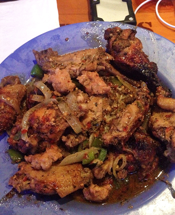 Caribbean heat meets Florida hospitality. These jerk-seasoned wings with sautéed onions and peppers might have you booking a flight to Jamaica tomorrow.