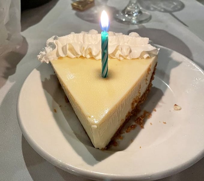 Key lime pie that strikes the perfect balance between sweet and tart—like Florida itself, wrapped in a graham cracker crust and topped with a birthday candle.