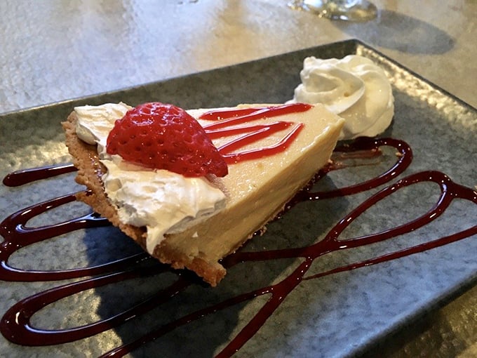 The key lime pie arrives like Florida sunshine on a plate—the perfect balance of tart and sweet that makes you want to slap the table and say "Now that's the real deal!"