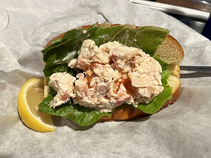 The lobster roll—chunks of sweet meat barely dressed, letting the star of the show shine on its perfectly toasted throne.