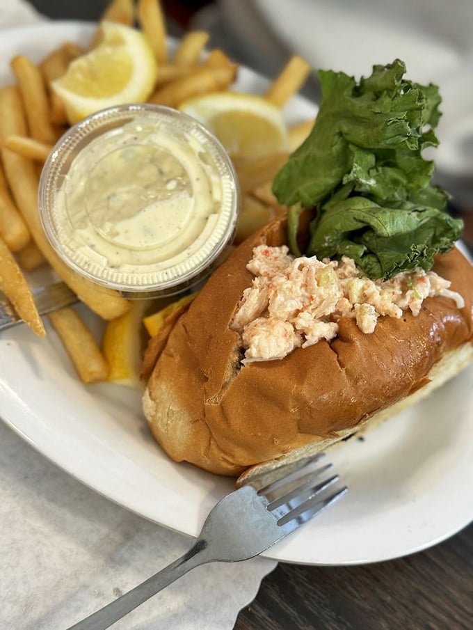 Seafood royalty on a humble throne – this lobster roll delivers sweet, tender meat with just enough mayo to make everything play nicely together.
