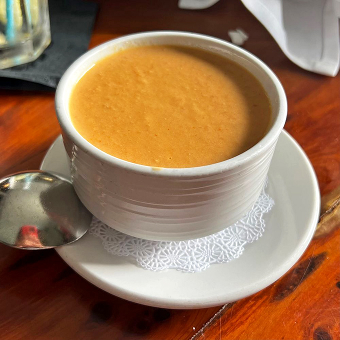 Lobster bisque so velvety it should come with a warning label. This copper-hued elixir delivers comfort and luxury in each spoonful.