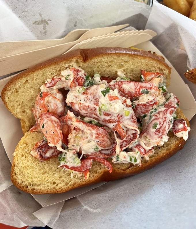 Lobster roll heaven! Chunks of sweet lobster meat dressed just right and nestled in a perfectly toasted bun—summer on a plate.