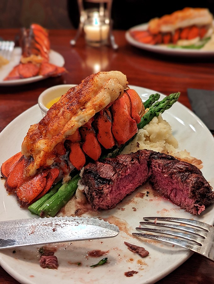 That perfectly roasted lobster tail lounging next to a medium-rare filet isn't just surf and turf—it's land and sea calling a delicious truce on your plate.