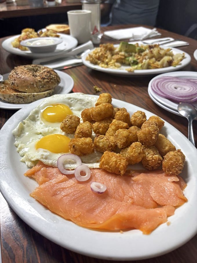 Lox, eggs, and those gloriously golden tater tots create a breakfast that bridges deli tradition with diner comfort—the breakfast equivalent of a warm hug.
