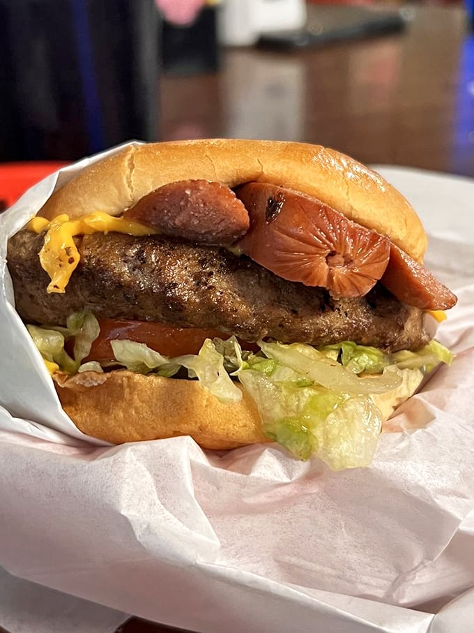 The Lutes Special Burger defies convention by adding a hot dog to the party – like inviting both Sinatra and Elvis to the same show.