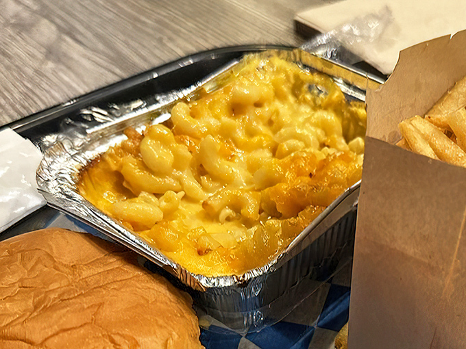 Mac and cheese that doesn't just sit there looking pretty—it bubbles with molten cheese promise that would make your grandmother secretly jealous.