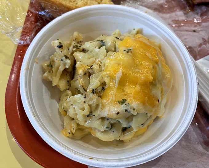 Mac & cheese that doesn't just accompany the meat—it demands equal billing. That golden crust is sending all the right signals.