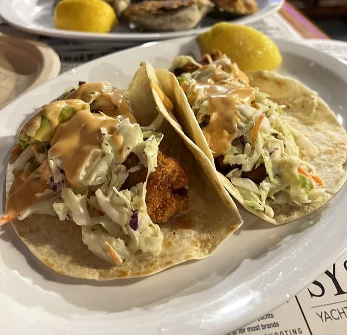 Fish tacos done right—crispy, fresh, and topped with enough slaw to make your doctor count it as a vegetable serving. Florida on a plate.