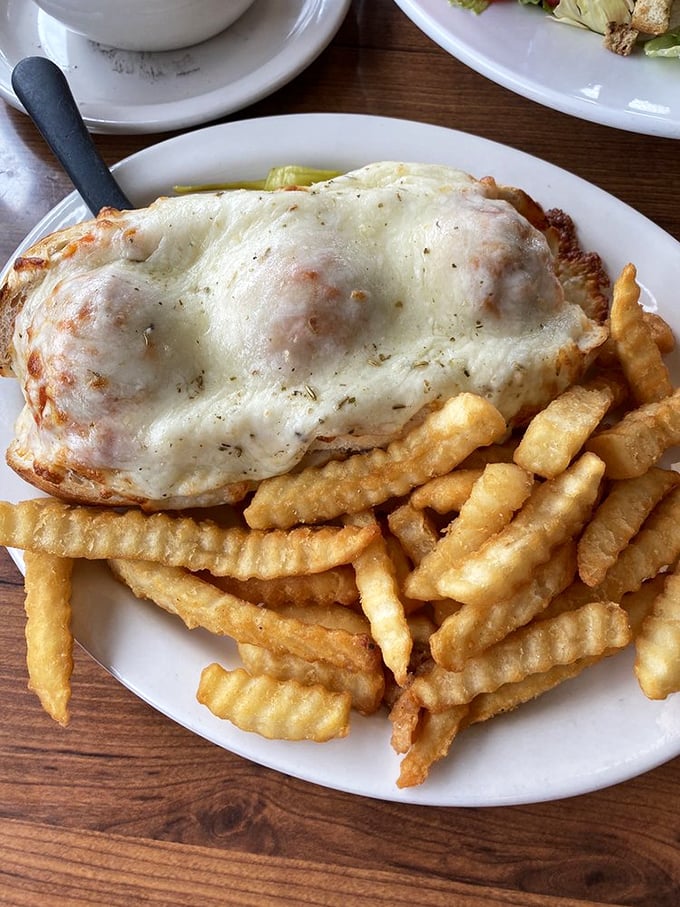 Melted cheese cascading over Italian meatballs – this isn't just a sandwich, it's an engineering marvel of comfort food.v