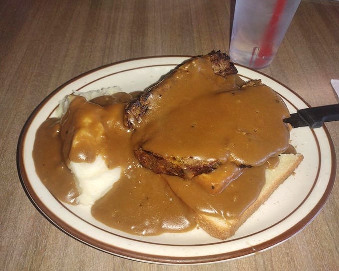 Meatloaf swimming in gravy that your grandmother would approve of—if she wasn't so busy being jealous that someone else made it better.