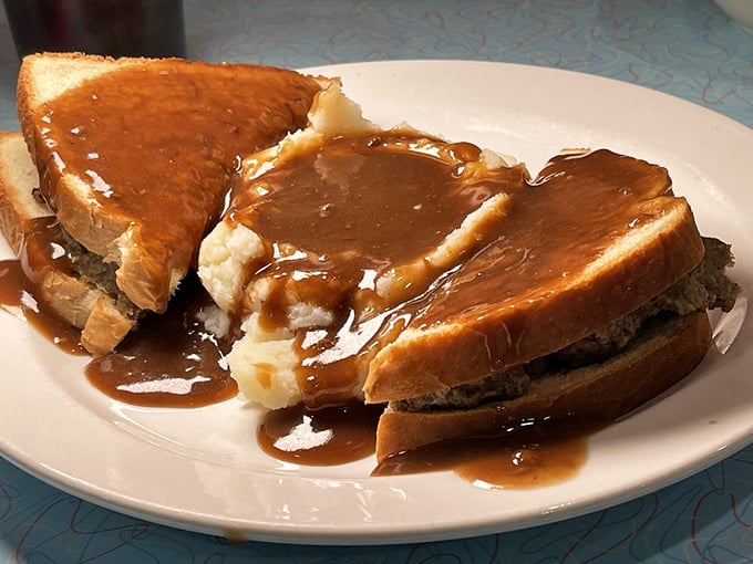 The hot turkey sandwich—where Thanksgiving meets Tuesday lunch. That gravy river flowing through mashed potato mountains is comfort on a plate.