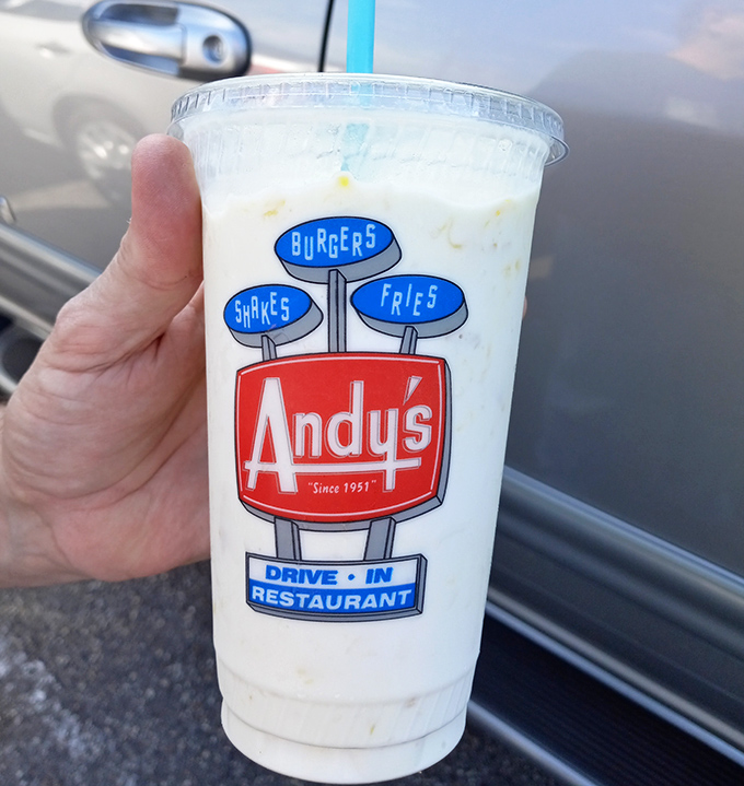 The milkshake that launched a thousand road trips. That cup isn't just holding a beverage—it's cradling liquid nostalgia with a side of brain freeze.