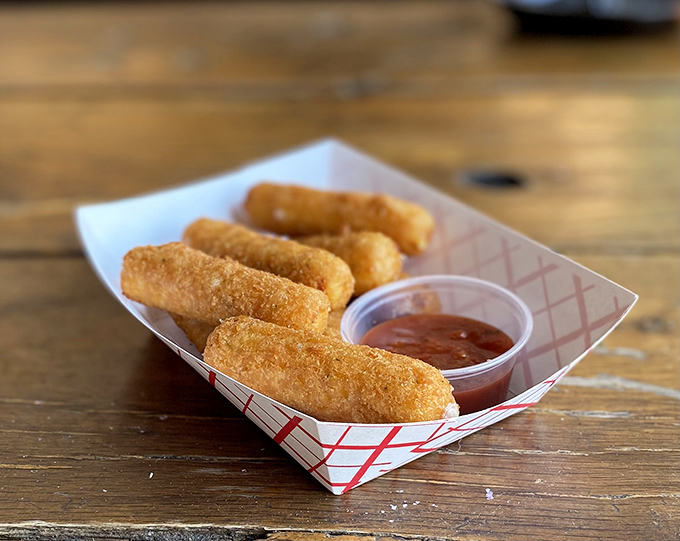 Mozzarella sticks: the diplomat of the appetizer world. Even your pickiest relative will reach across the table for these golden treasures. 