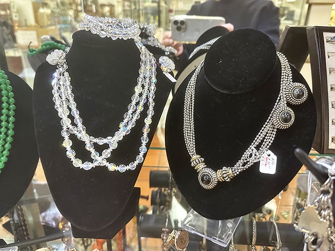 Crystal beads and ornate silver settings—these necklaces weren't just accessories but statements, worn during eras when "going viral" meant catching the flu.