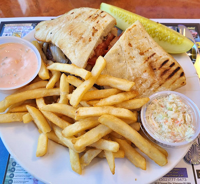 Grilled to perfection, this panini demonstrates the architectural principle that good sandwiches, like good relationships, need proper structure.