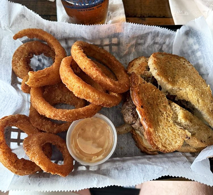The perfect onion ring doesn't exi— Oh wait, here it is, alongside a patty melt that would make your cardiologist wince and your taste buds applaud.