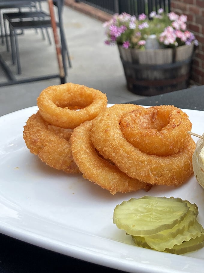 These aren't just onion rings; they're golden halos of crispy perfection that make you wonder why vegetables ever bothered being healthy.