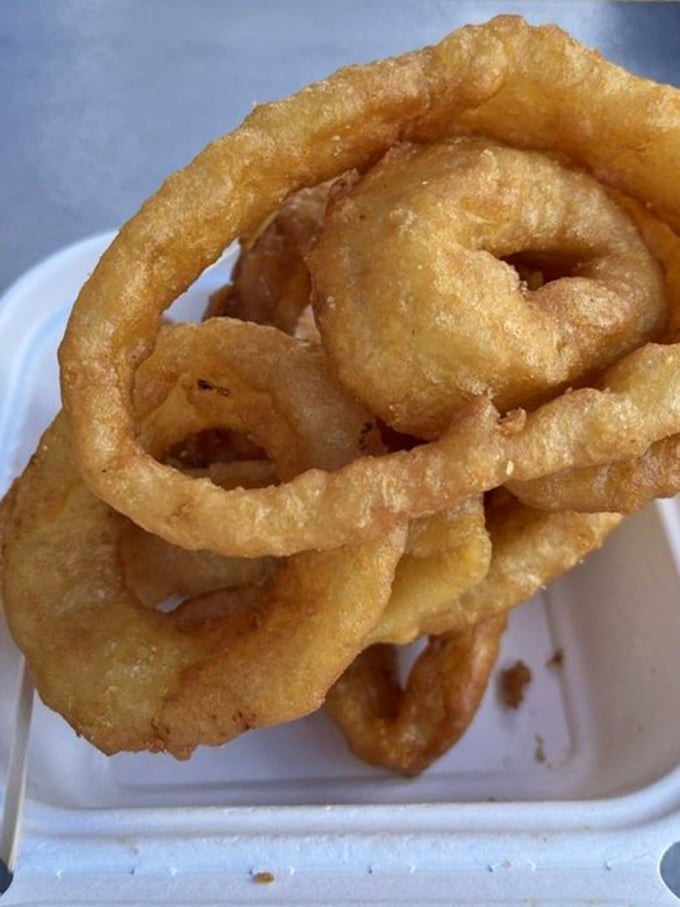 Golden rings of joy that shatter with each bite – these aren't your sad fast-food onion rings; these are their successful cousins.