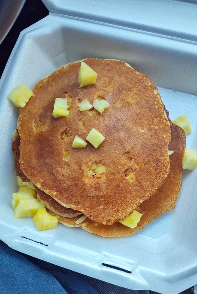 These golden pancakes dotted with pineapple chunks aren't just breakfast—they're your excuse to start the day with dessert.