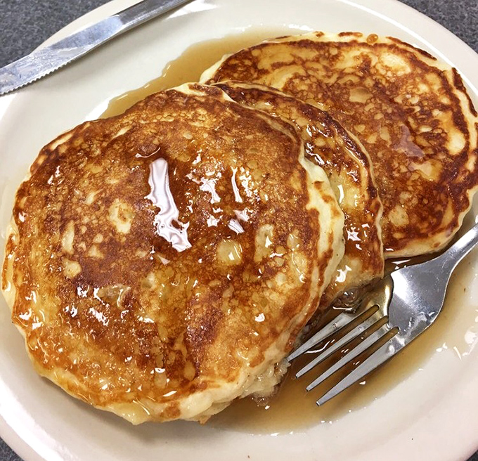 These pancakes achieve that mythical balance—crispy edges, fluffy centers, and just waiting for their maple syrup baptism.