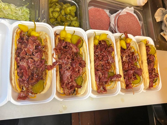Pastrami paradise! These sandwiches pile thin-sliced, perfectly seasoned meat so high you'll need to unhinge your jaw like a snake.
