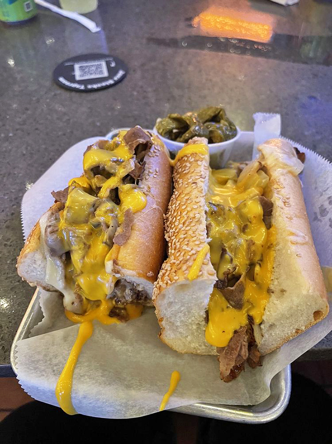 The holy grail of Philadelphia cuisine – cheese cascading down thinly sliced beef, nestled in a perfect roll. Poetry you can eat.
