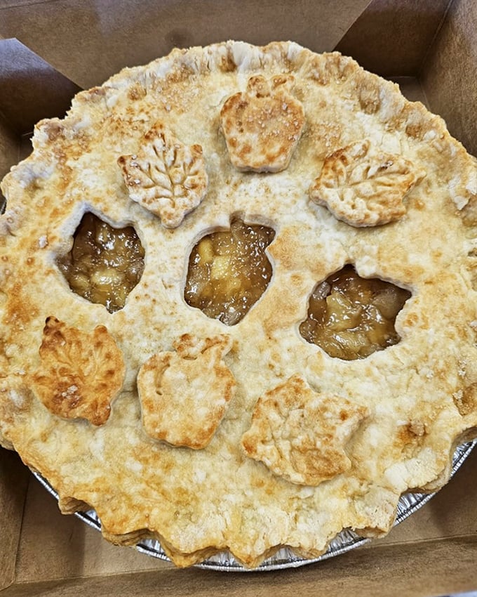 This isn't just apple pie – it's edible artwork with those adorable leaf cutouts. Grandma would approve, then secretly take notes.