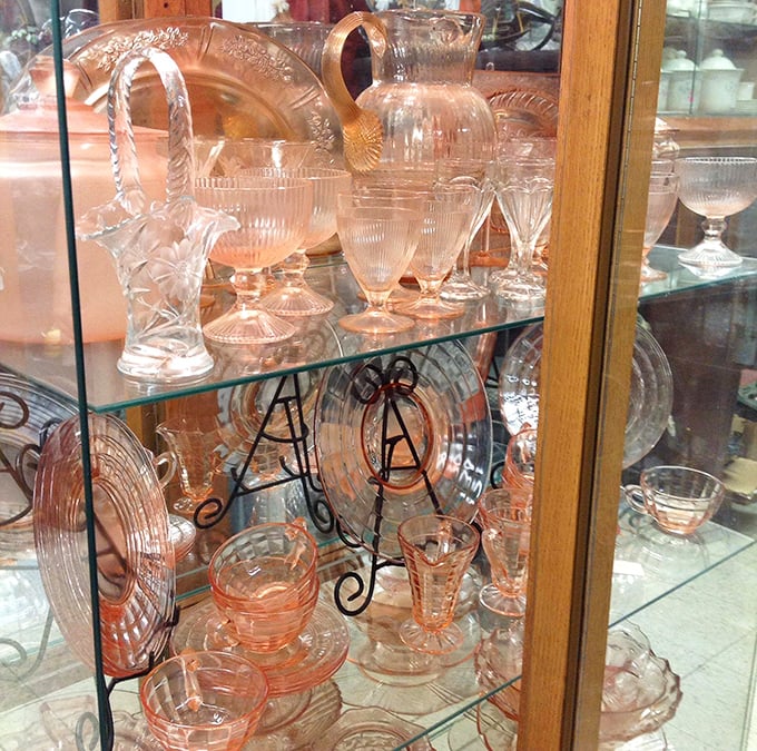 Pink Depression glass that somehow manages to look cheerful. Ironic how something born from hard times now brings such joy to collectors.