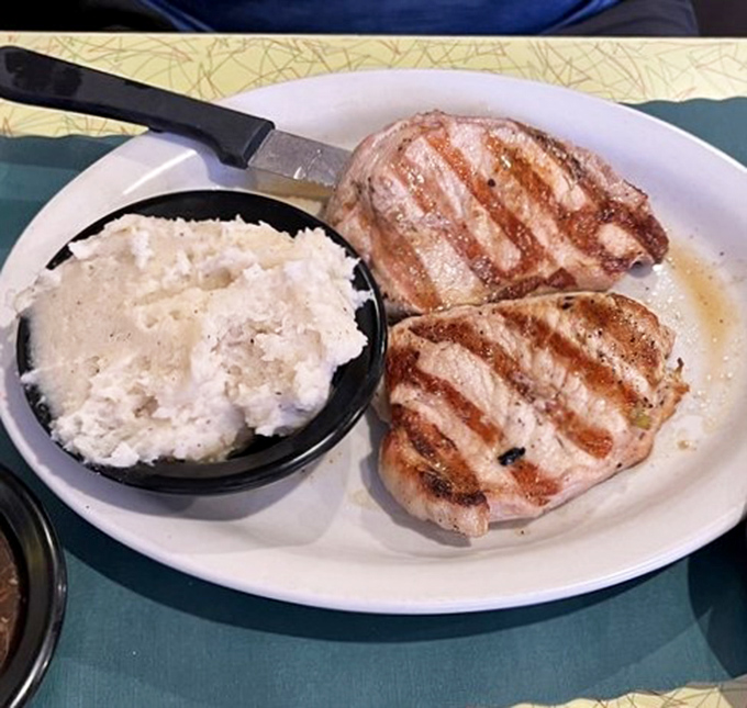 These grilled pork chops with cloud-like mashed potatoes aren't just dinner—they're edible proof that simplicity, done right, beats complexity every time.