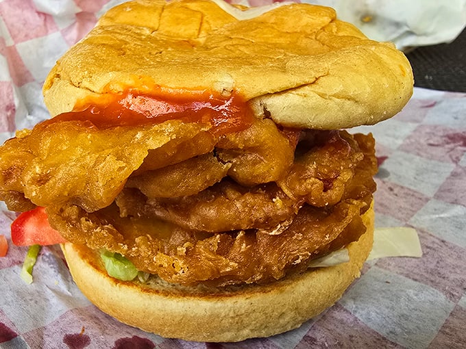 The legendary pork tenderloin that launched a thousand road trips. Crispy, golden exterior gives way to juicy pork beneath—this isn't just a sandwich, it's Kansas City history.