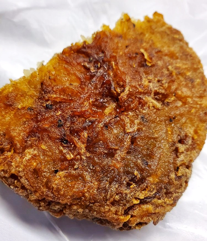 The humble potato, transformed into a crispy, golden disc of joy. This latke isn't just food—it's edible sunshine.