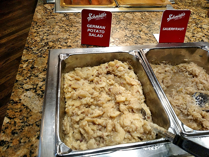 The German potato salad and sauerkraut—warm, tangy side dishes that have converted countless "I don't like sauerkraut" people over the years.