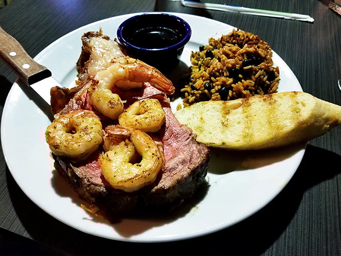 Surf meets turf in perfect harmony – tender prime rib crowned with succulent shrimp that would make even the most dedicated seafood skeptic swoon.