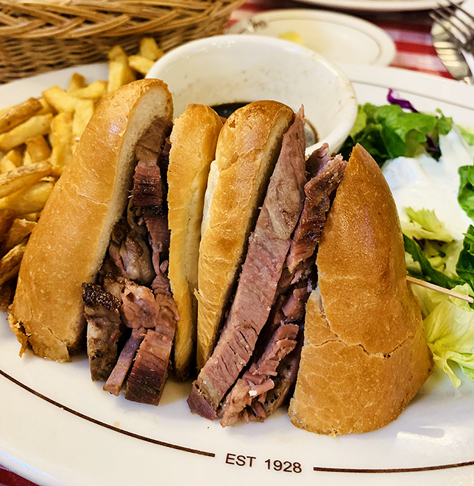 This prime rib sandwich isn't messing around—it's the heavyweight champion of lunch, with perfectly pink meat that practically melts on contact.