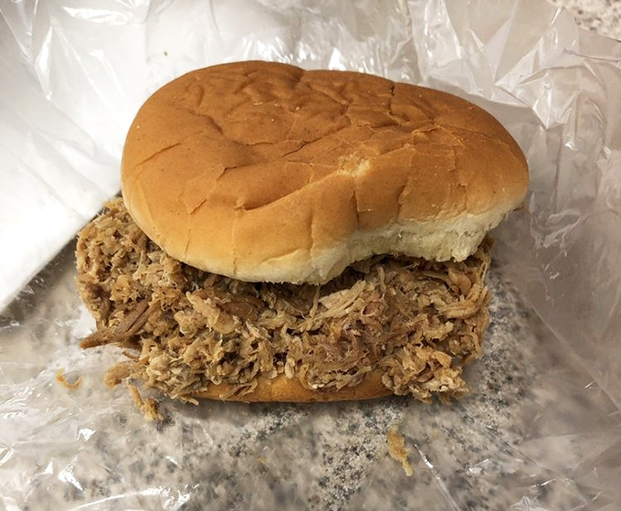 Pulled pork perfection – tender, smoky goodness piled high on a soft bun. The kind of sandwich that ruins all other sandwiches for you.