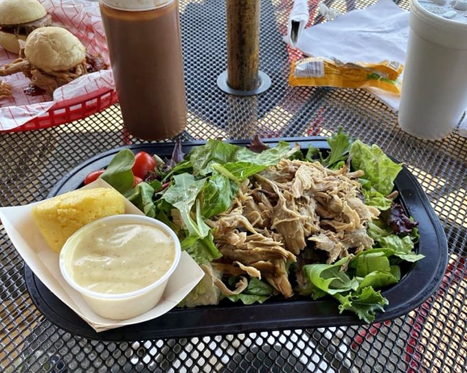 Pulled pork transforms humble greens into a masterpiece worthy of Sunday dinner table conversations everywhere.
