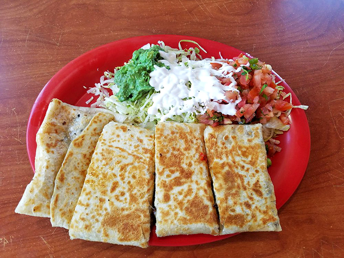 Golden quesadilla perfection that transforms simple ingredients into something approaching pure comfort food magic.